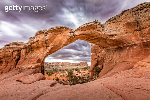 The famous Broken Arch in the Arches National Park, Utah and dramatic ...