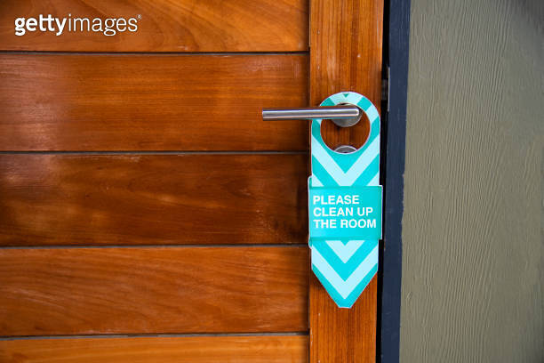 Please clean the room.With sign PLEASE MAKE UP ROOM on handle at hotel ...