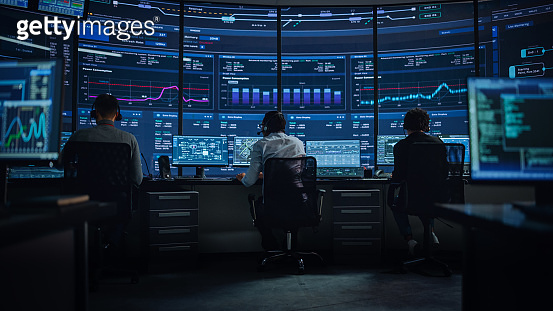 Professional IT Technical Support Specialists and Software Programmer Working on Computers in ...