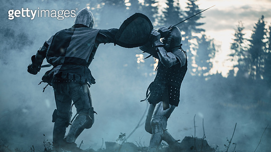 Dark Age Battlefield: Two Armored Medieval Knights Fighting with Swords ...