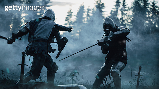 Dark Age Battlefield: Two Armored Medieval Knights Fighting with Swords ...