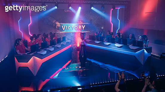 Two Esport Teams of Pro Gamers Play in RPG Strategy Video Game on a ...