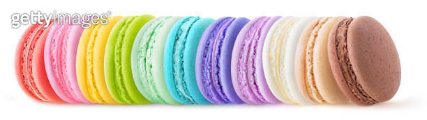 Rainbow colored macaroons in a row isolated on white background 이미지 ...