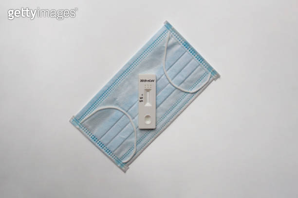 Covid-19 PCR test and medical face mask from above 이미지 (1323570475 ...