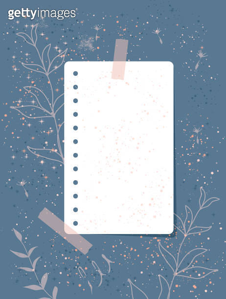 A sheet of notebook paper taped to wall. Note paper on a dark blue ...