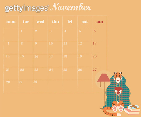 A colorful November 2022 diary featuring a cute tiger wrapped in a ...