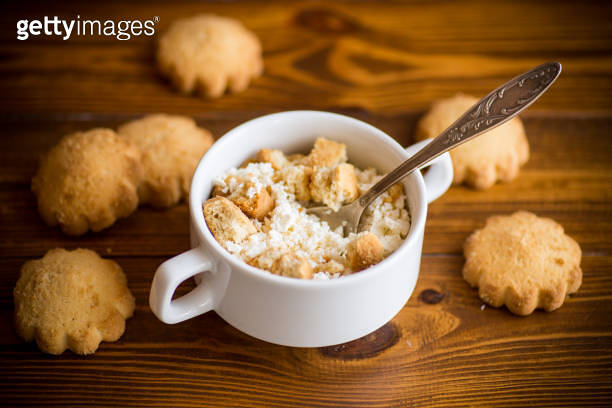 Homemade cottage cheese with pieces of shortbread cookies for breakfast ...
