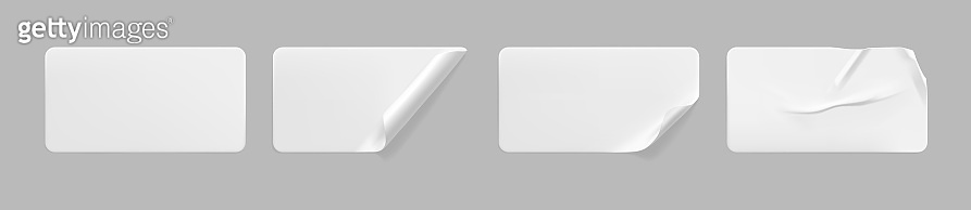 Crumpled white rectangle sticker label set isolated. Blank glued ...