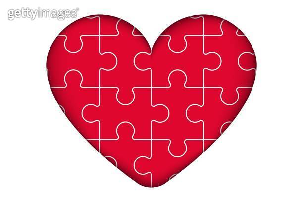 Heart puzzle Jigsaw puzzle with all its pieces put together forming a ...