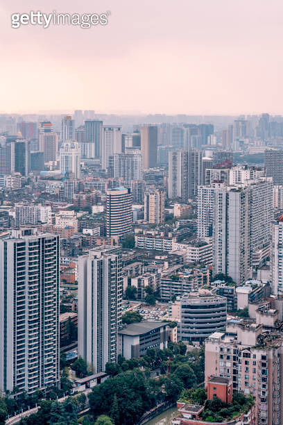 The city ' s modern tall buildings are dense at dusk in Chengdu in ...
