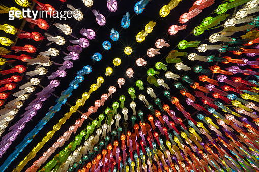 Colorful illuminated lanterns or lamps at night in travel trip and ...