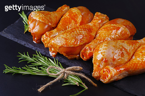 Ogranic food and healthy eating concept.Marinated chicken dramstick on ...