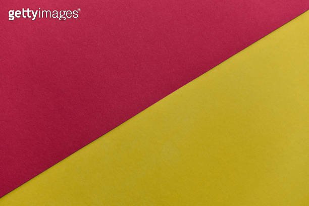 Abstract color paper and colorful paper background. red and yellow ...