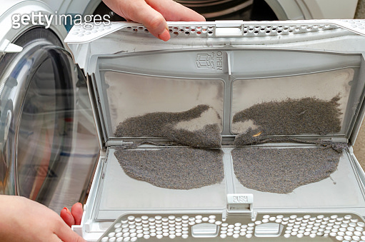 Cleaning the dryer filter. Dryer filter, retains dust and dirt ...