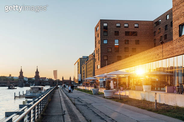 promenade with restaurants at spree river in Berlin, Germany ...