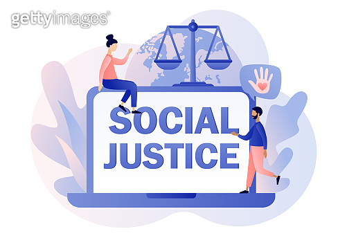 Social justice - text on laptop screen. Human rights concept. Scales as symbol of equality ...