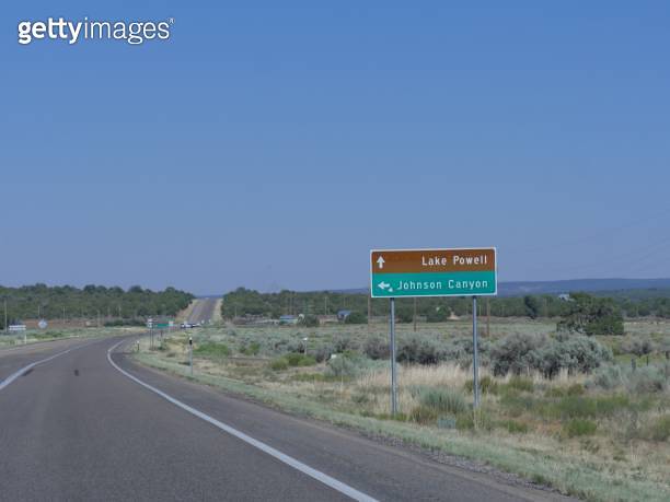 Roadside sign and directions to Lake Powell and Johnson Canyon in ...