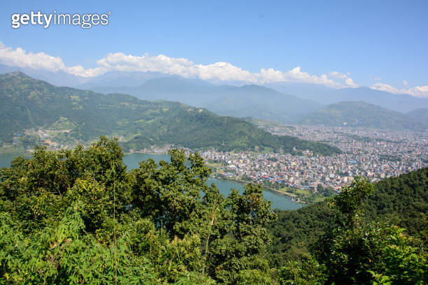 A top view of Fewa Lake and its surroundings in the city of Pokhara ...