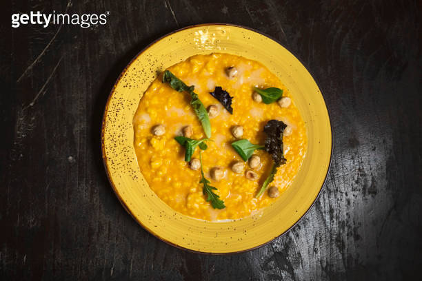 Saffron risotto with vegetable garnish 이미지 (1358771972) - 게티이미지뱅크