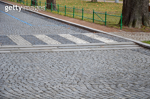 safety ramp for slowing down traffic to a residential street where ...