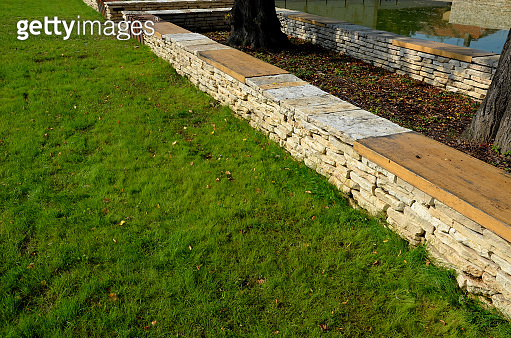 stone marl walls with stone cladding by the pool, ponds, fire tanks ...