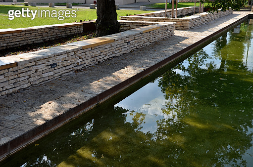 stone marl walls with stone cladding by the pool, ponds, fire tanks ...