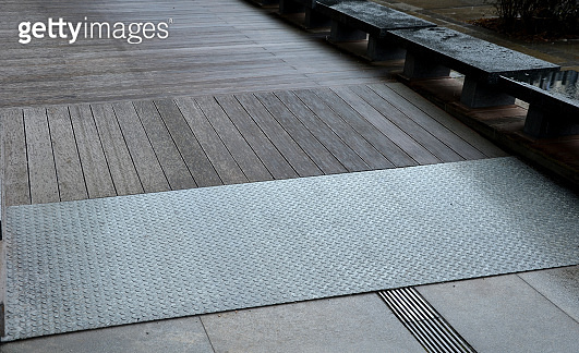 tropical wood plank ramp with wheelchair specially adapted for ...