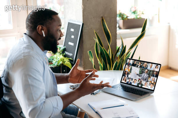 Virtual online meeting by video call. African American man ...