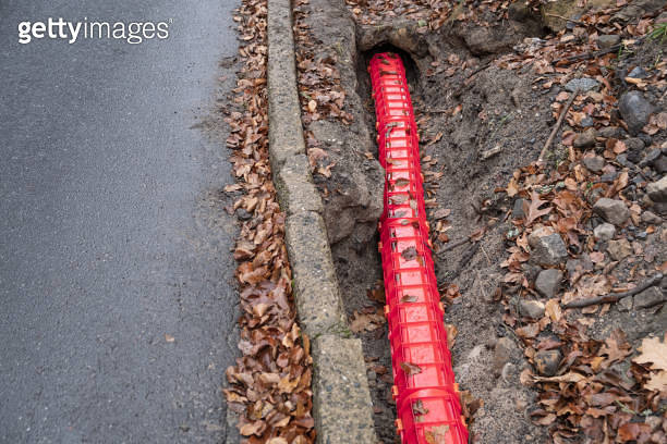 Communication Cables covered by red plastic flexible tube, Network ...