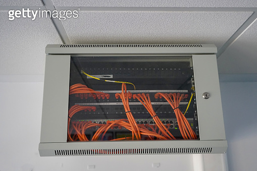 Network switch cabinet high up on a ceiling in a office 이미지 (1322540938 ...