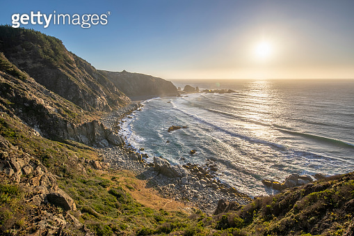 An awe sunset in an idyllic beach landscape with the sunset over the ...