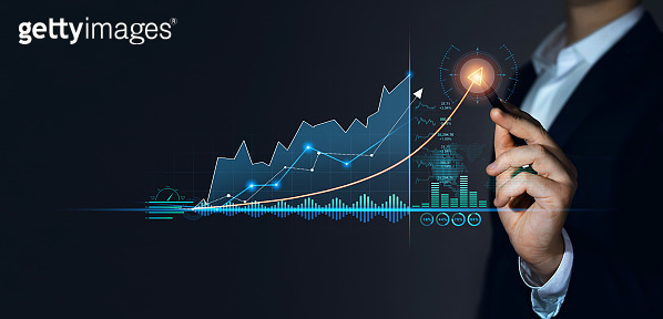 Businessman draws with pen growth graph of business. Business strategy ...