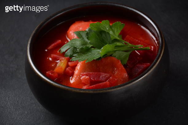 Hot red beet Kubbeh soup, a famous middle eastern dumplings soup dish ...