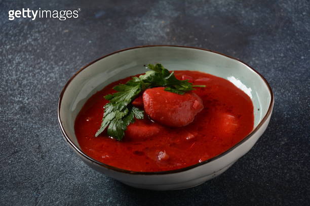 Hot red beet Kubbeh soup, a famous middle eastern dumplings soup dish ...