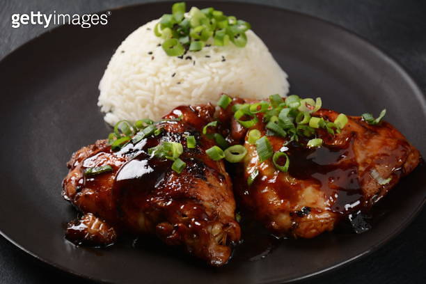 Chicken thighs marinated and cooked in adobo sauce. National filipino ...