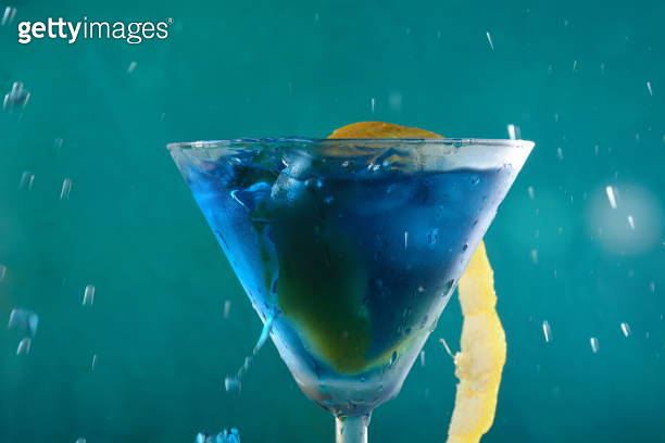 Blue lagoon cocktail with blue curacao liqueur, vodka, lemon juice and ...