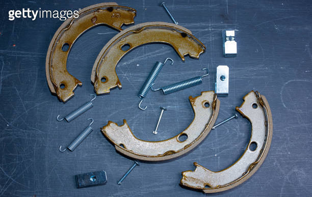 new brake pads of the hand parking brake of the car and a repair kit of ...