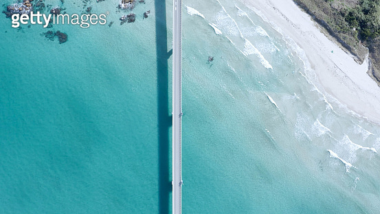 White sand beach."Tsunoshima Bridge" in Yamaguchi Prefecture, Japan. A ...