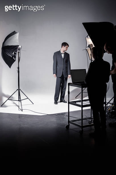 People Working Behind the Scenes while Filming on a Film Set 이미지 ...