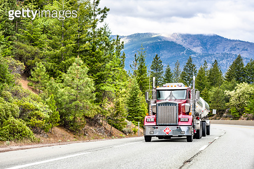 Powerful shiny red big rig classic bonnet semi truck with chrome ...