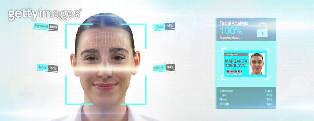Biometric scanner is scanning face of young woman. Artificial ...