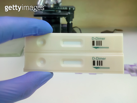 Close up view of Scientist or technician glove hand hold devices of D ...