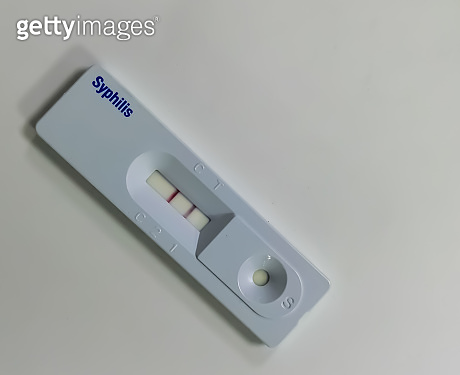 Close view of device of Syphilis, rapid screening test show positive ...