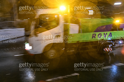 Winter service vehicle truck clearing the roads around the city of ...