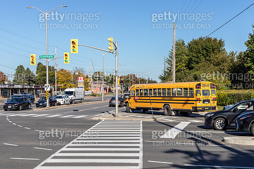 Intersection in Ottawa, Canada with traffic lights, crosswalk, school ...
