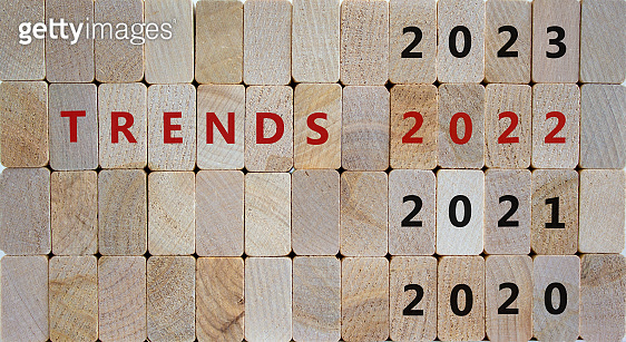 Business concept of 2022 trends. Wooden cubes with words 'TRENDS 2022 ...