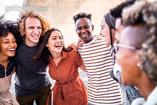 Young happy people laughing together - Multiracial friends group having ...