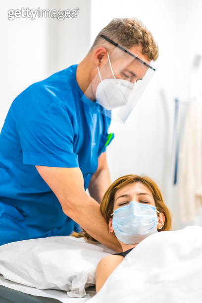 Structural osteopathy of a physiotherapist with protective measures for ...