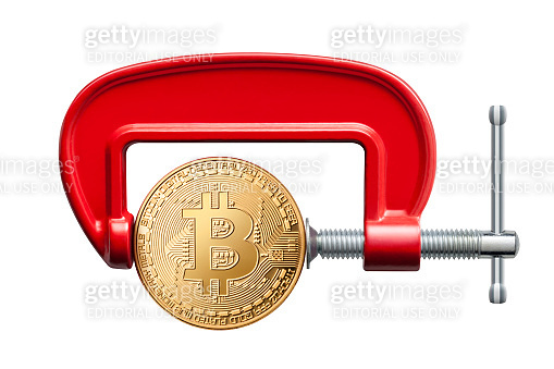 The bitcoin crisis. Clamp compression tool with bitcoin. (1318974793 ...