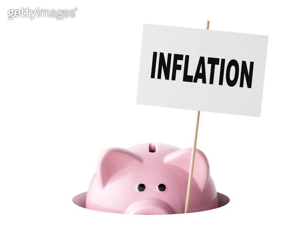 Piggy bank and a placard with the inscription "inflation" (1355601598 ...